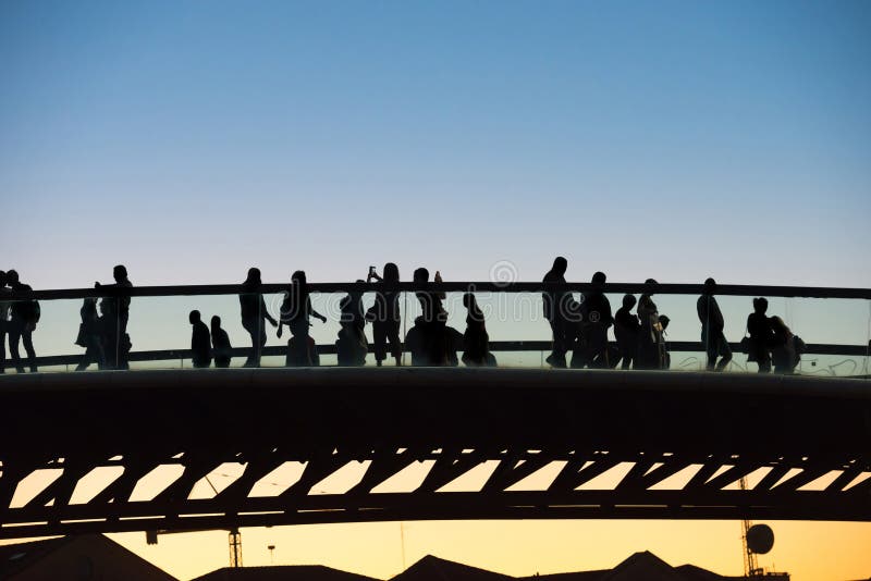 Silhouette of Walking People on Bridge Editorial Photography - Image of ...
