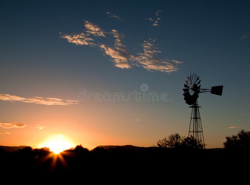 Windmill Sunset in Central Australia Stock Photo - Image of outback ...