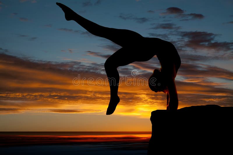 Silhouette of Woman Dancing Back Bend Legs Going Back by Water Stock ...
