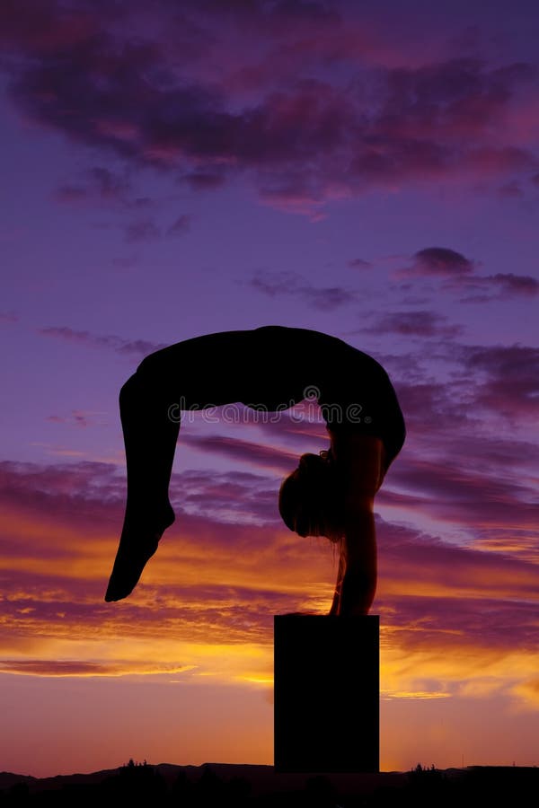 Silhouette of Woman Dancing Legs Behind Head Off Ground Stock Image ...