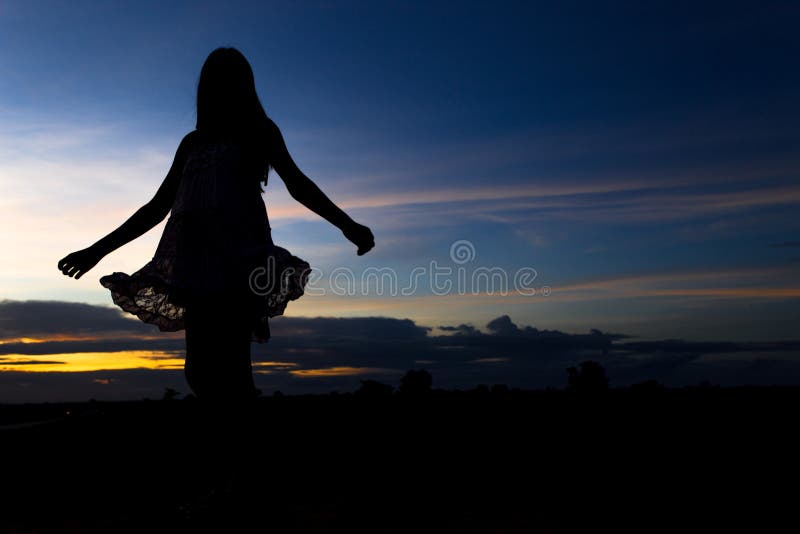 Silhouette of Woman Posing at Sunset or Sunrise Stock Image - Image of ...