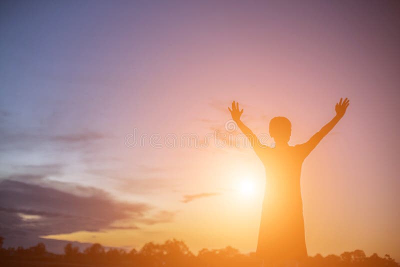 Silhouette of Woman Praying Over Beautiful Sky Background. Stock Image ...