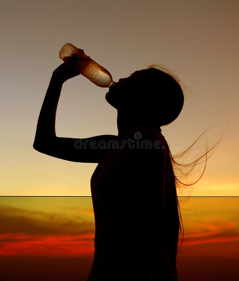 Silhouette of Woman Rehydrate and Refresh at Sunset Stock Photo - Image ...