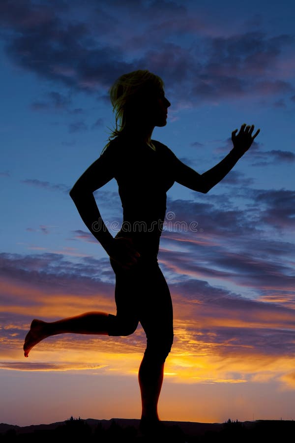 Silhouette of a Woman Running in the Sunset Stock Image - Image of ...