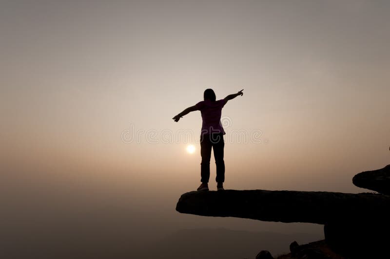 Silhouette of Woman Success on Top Mountain at Sunset, Selective Stock ...