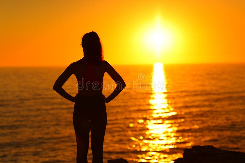 Silhouette of a Woman Celebrating at Sunset in Outskirts Stock Image ...