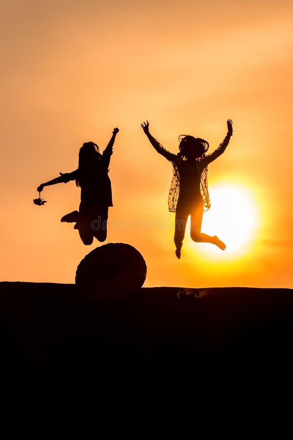 Silhouette of happy women stock image. Image of young - 68986839
