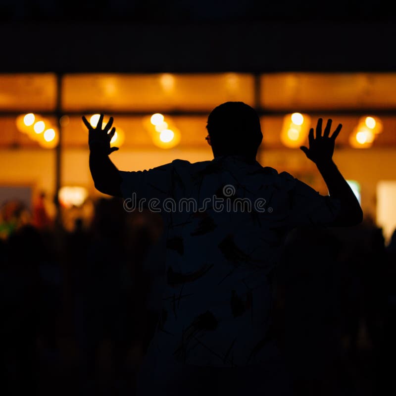 Silhouette of a Young Man Dancing Outside during a Night Party Stock ...