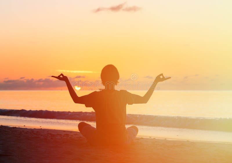 Silhouette of Young Man Doing Yoga at Sunset Stock Photo - Image of ...