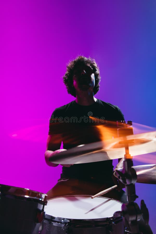 Silhouette of Young Man Drummer Playing Isolated on Blue-pink ...