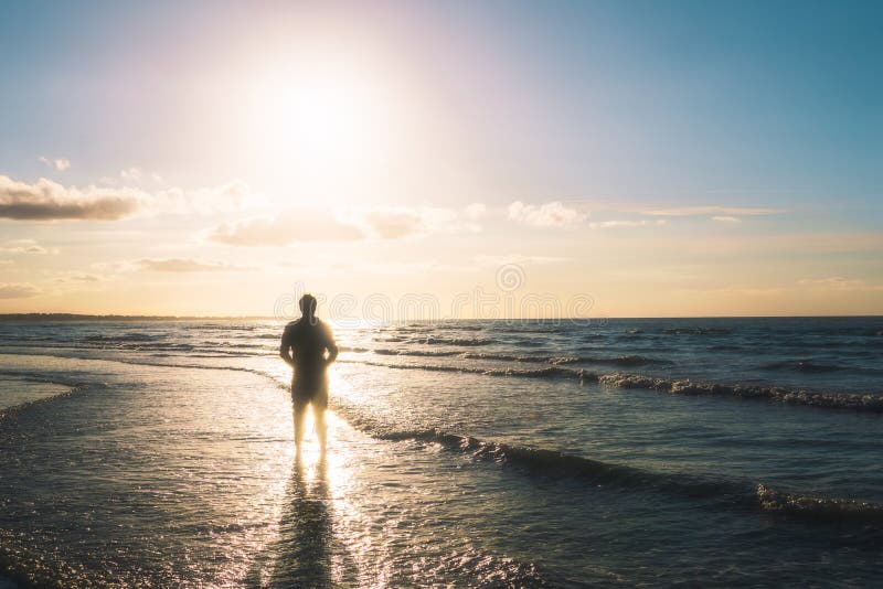 Man facing the sun stock image. Image of crests, protection - 65850565