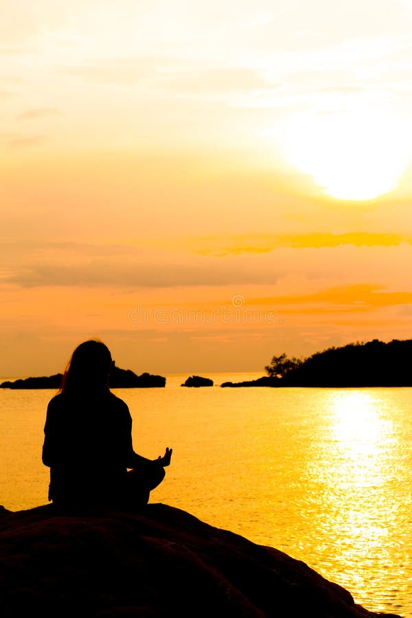 Silhouette of Young Woman Standing at Relax Pose or Freedom Pose or ...