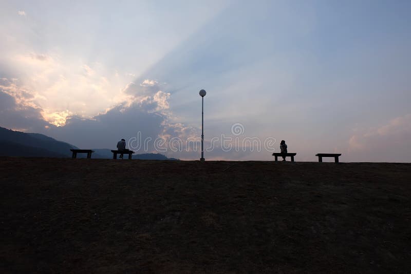 Silhouette of Young Woman Watching Warm Setting Sun. Stock Photo ...