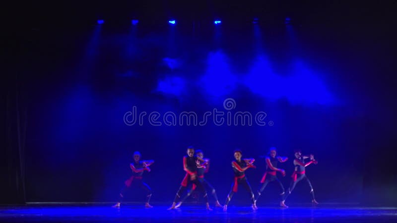 Silhouetted Dancers Move Rhythmically in a Neon-lit Room, Exuding ...
