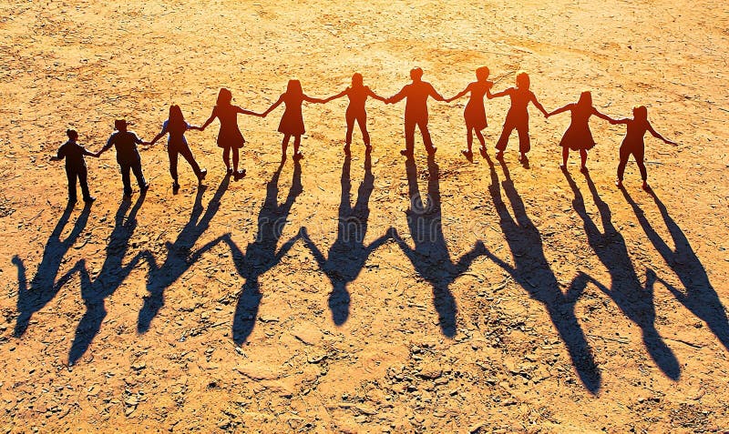 Silhouetted Group Holding Hands on Sand at Sunset, Unity Concept Stock ...