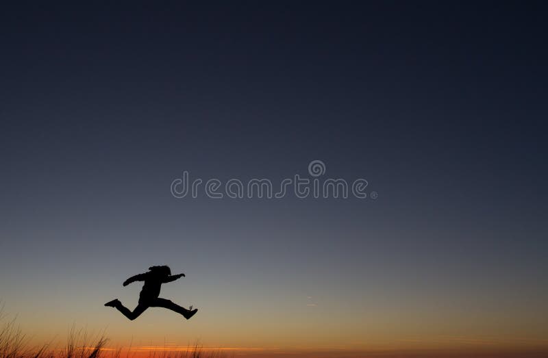 Man Jumping in Sunset on Mountain Stock Image - Image of happy, dawn ...