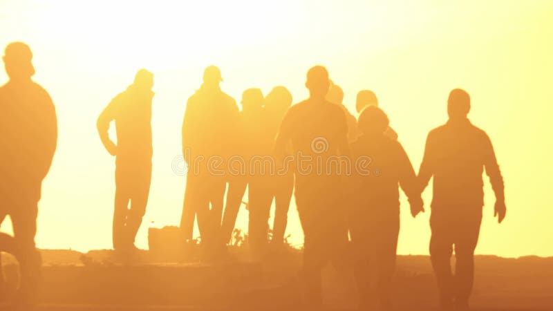 Silhouettes of Different People on the Observation Deck in the Light of ...