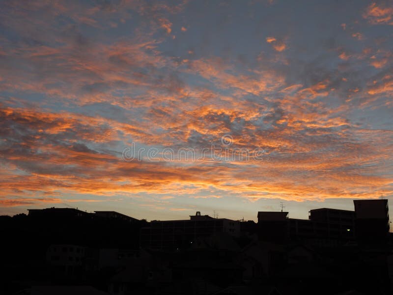 Silhouettes of Distant Buildings Under Dramatic Large Sky at Dawn Break ...