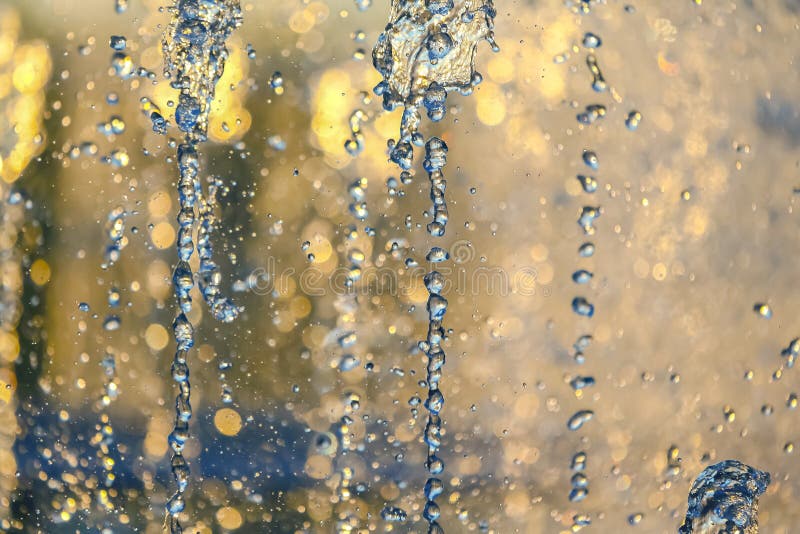 Silhouettes of Drops Falling Water Fountain Against the Backdrop of the ...