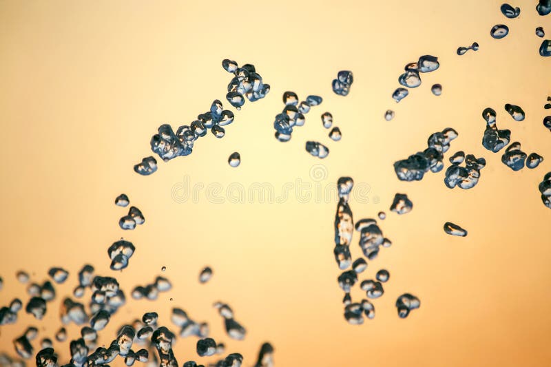 Silhouettes of Drops Falling Water Fountain Against the Backdrop of the ...