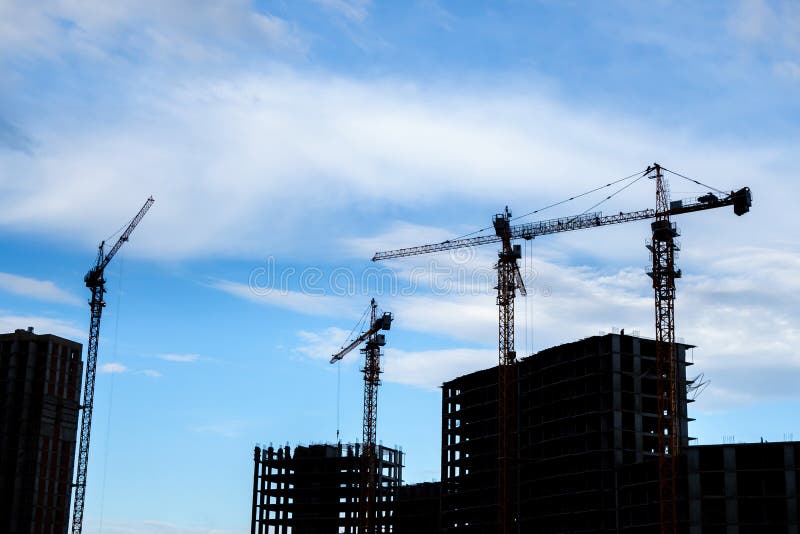 Silhouettes of New High Rise Buildings Under Constructions and Working ...