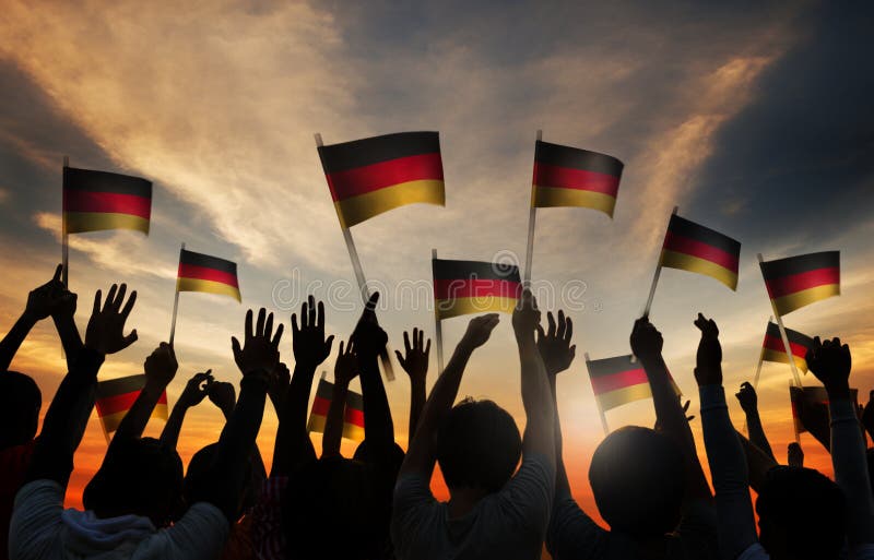 Silhouettes of People Holding the Flag of Germany Stock Photo - Image ...
