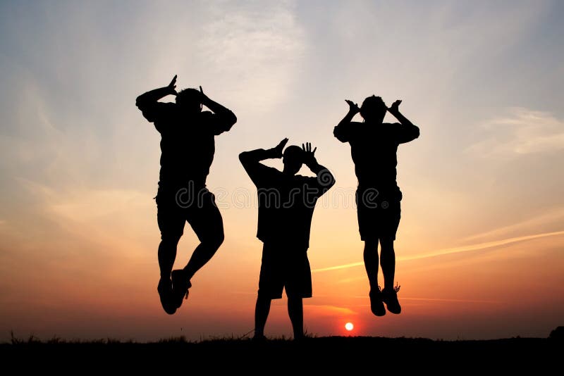 Silhouettes of Three Men Jumping Stock Image - Image of active, high ...