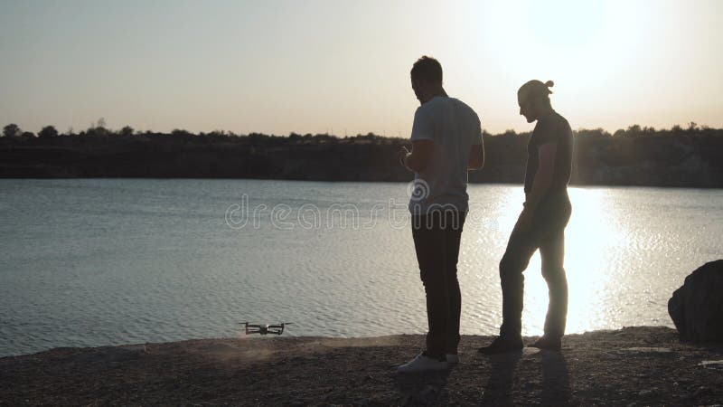 Men on Coast Controlling Drone Stock Image - Image of nature, control ...