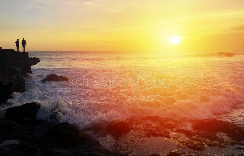 Silhouettes of Two People in Sunset Sun in Bali. Stock Photo - Image of ...