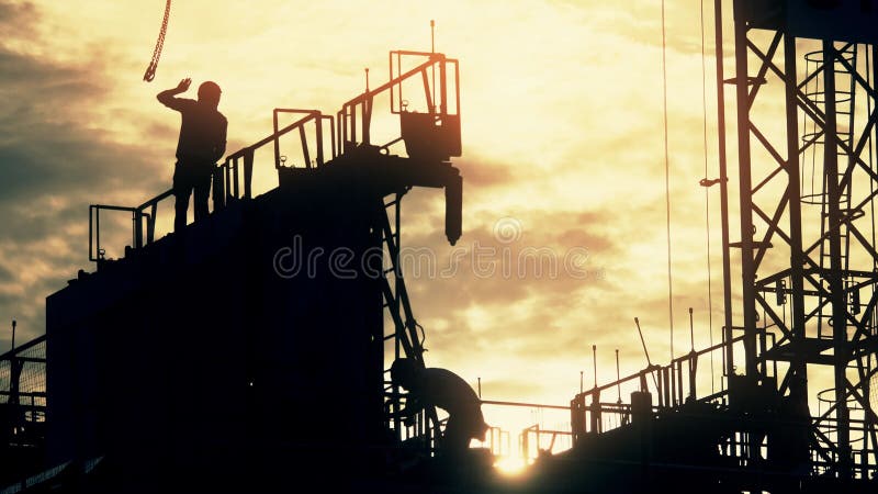 Silhouettes of Unknown Construction Workers on Modern Residential ...