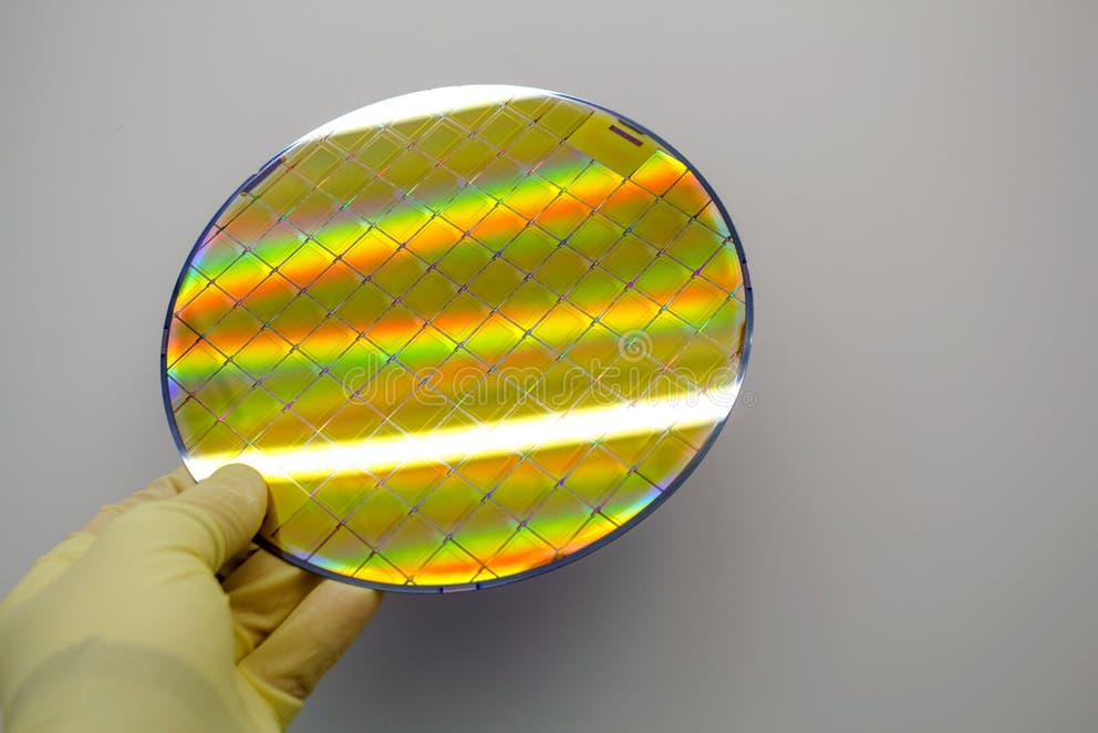 Silicon Wafer is Held in the Hands by Gloves - a Wafer is a Thin Slice ...