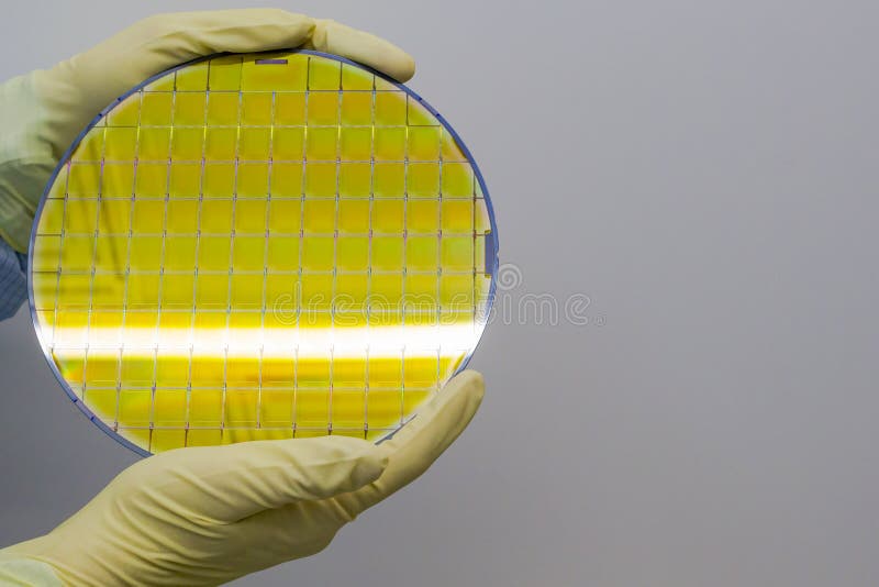 Silicon Wafer is Held in the Hands by Gloves - a Wafer is a Thin Slice ...