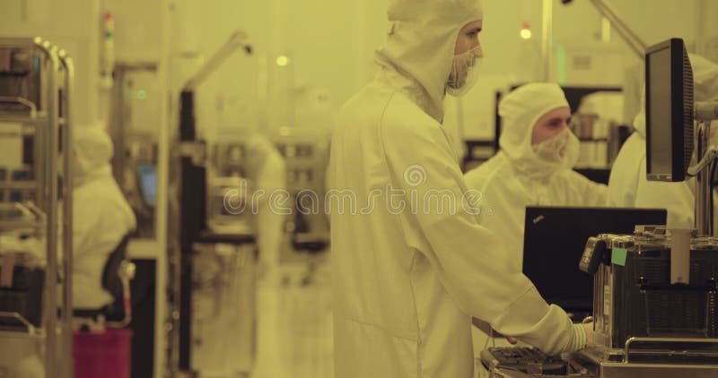 Silicon Wafer Manufacturing Process in a Clean Room Stock Footage ...