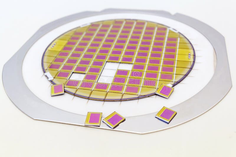 Silicon Wafer with Microchips Fixed in a Holder with a Steel Frame ... Silicon Wafer with Microchips Fixed in a Holder with a Steel Frame ...