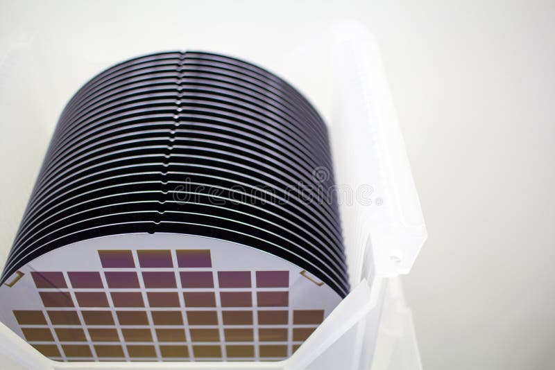 Silicon Wafers in White Plastic Holder Box on a Table- a Wafer is a ...