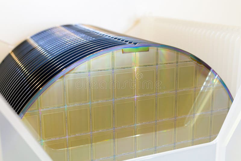 Silicon Wafers in White Plastic Holder Box on a Table- a Wafer is a ...
