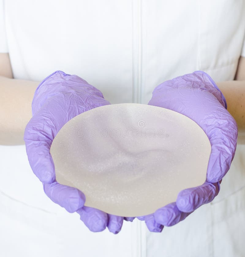 Silicone Breast Implants. Nurse Holding Implants. Doctor Holding ...