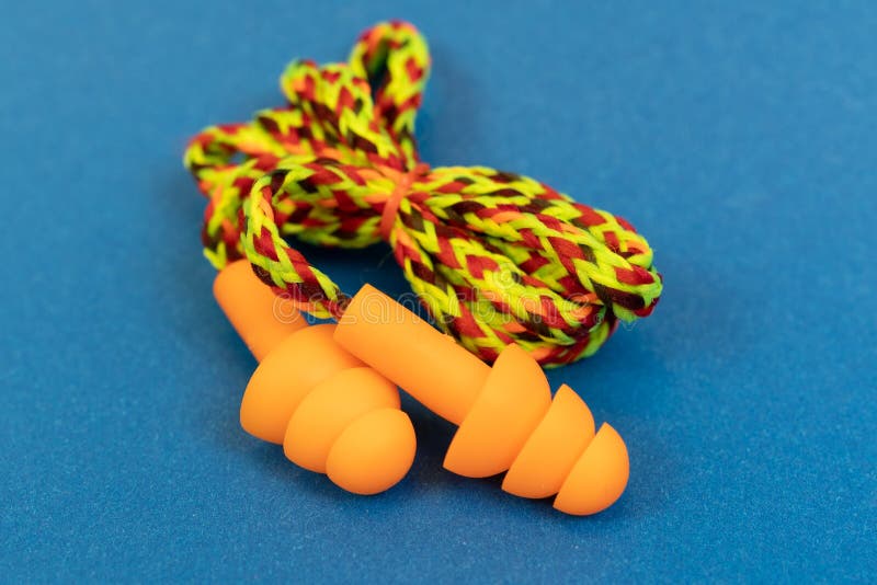 Silicone Ear Plugs for Human Ears on Blue Background Stock Photo ...