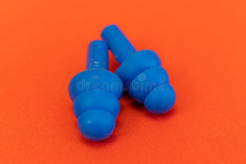 Silicone Ear Plugs for Human Ears on Red Background Stock Photo - Image ...