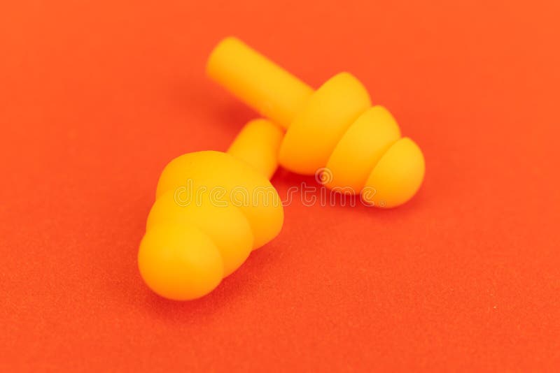 Silicone Ear Plugs for Human Ears on Red Background Stock Photo - Image ...