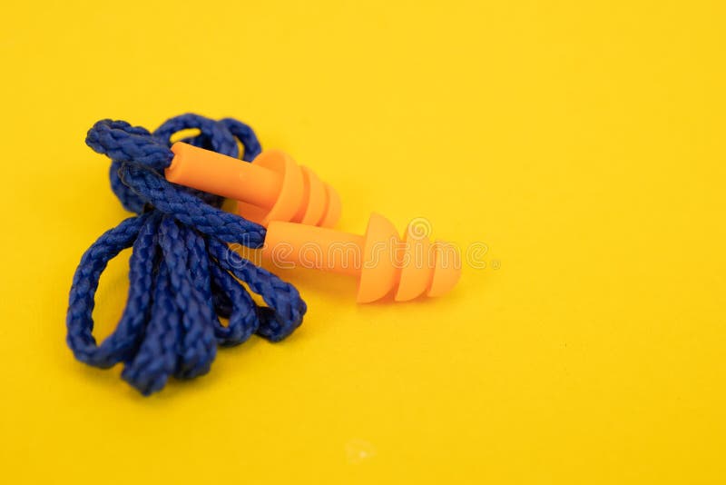 Silicone Ear Plugs for Human Ears on Yellow Background Stock Image ...