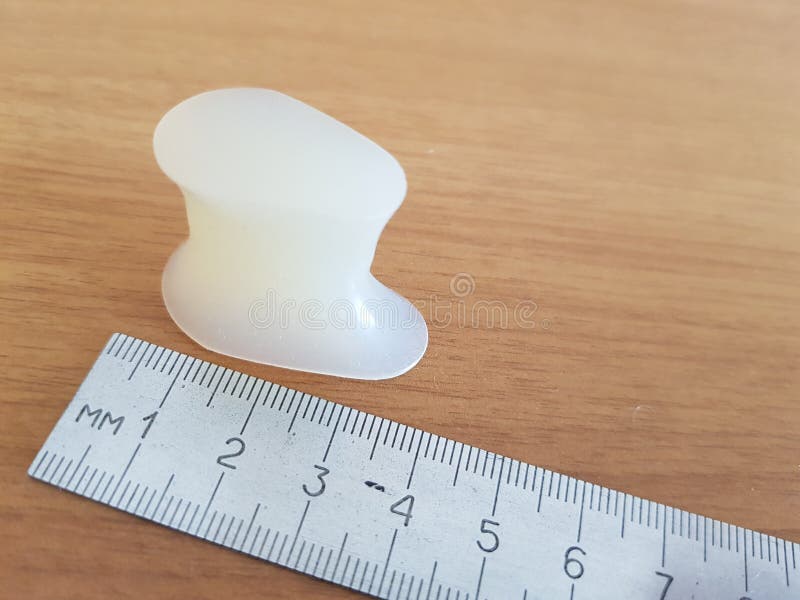 Silicone Toe Spacer and Ruler Stock Image - Image of control, ball ...