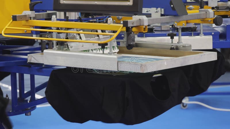 Screen Printing Machine stock video. Video of shirts - 261371413