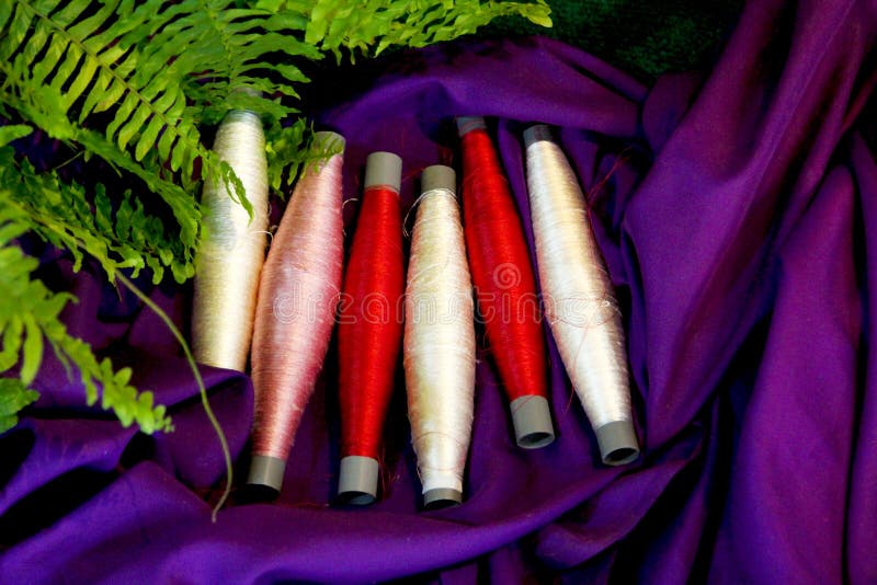 Silk thread in roller. stock image. Image of filament - 136143905