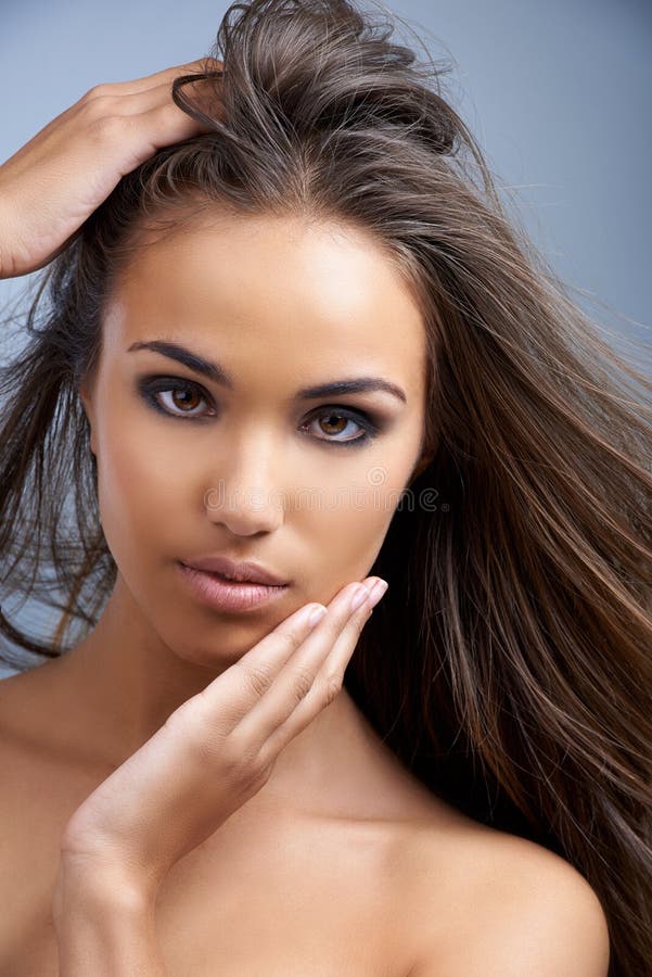 Silky Hair. Studio Head and Shoulders Shot of an Attractive Young Model ...