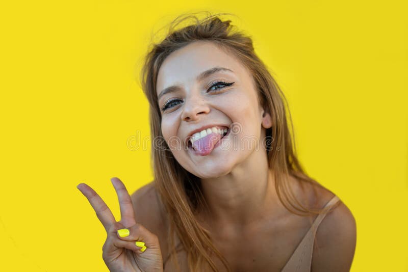 Blonde Woman Making Funny Face Positive Girl Acts On The Camera