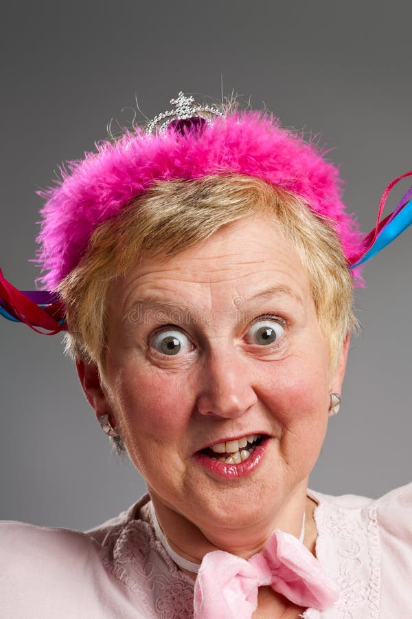 Silly face with pink tiara stock image. Image of years - 8370619
