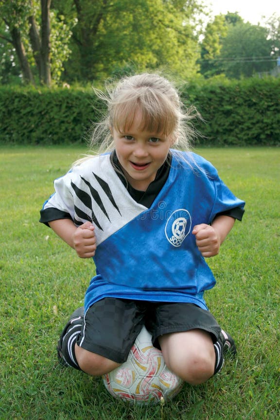 Silly soccer kid stock image. Image of cleats, adorable - 2610497