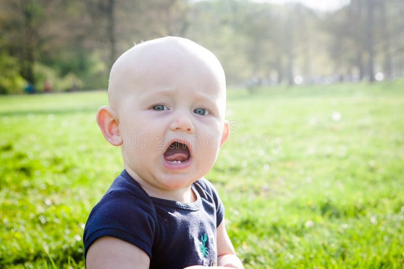 Silly Talking Baby stock image. Image of baby, blue, cute - 64298641