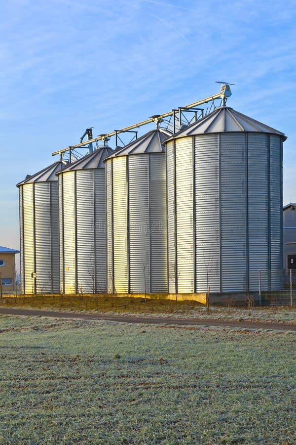 Grain Silos In Rural Landscape Stock Image - Image of bright, building ...